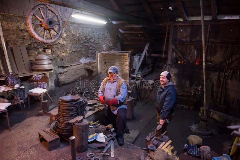 Portrait of Two Generations Traditional Blacksmith Stock Image - Image ...