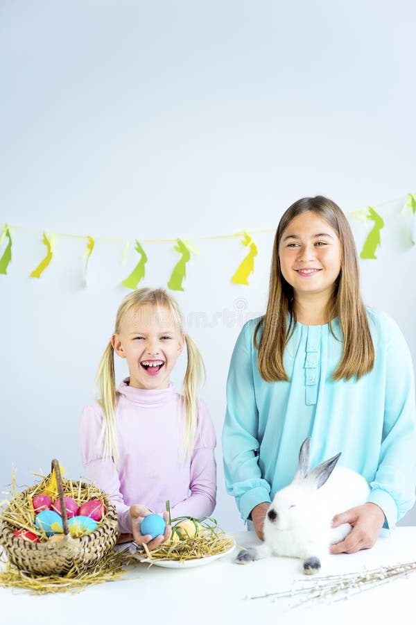 Girls with easter bunny stock photo. Image of holiday - 103066984