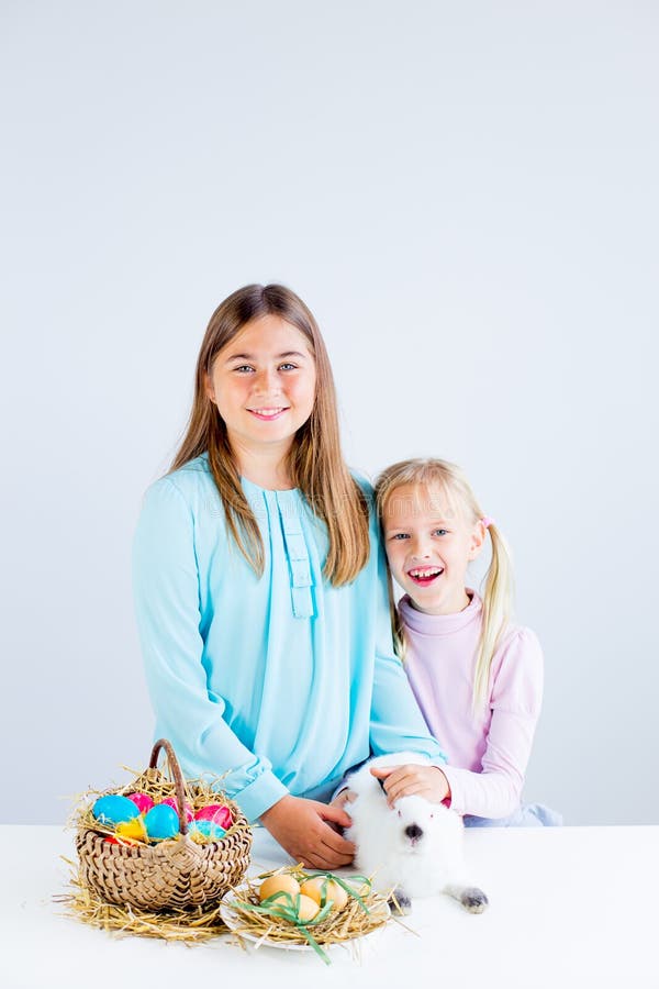 Girls with easter bunny stock photo. Image of holiday - 103066984