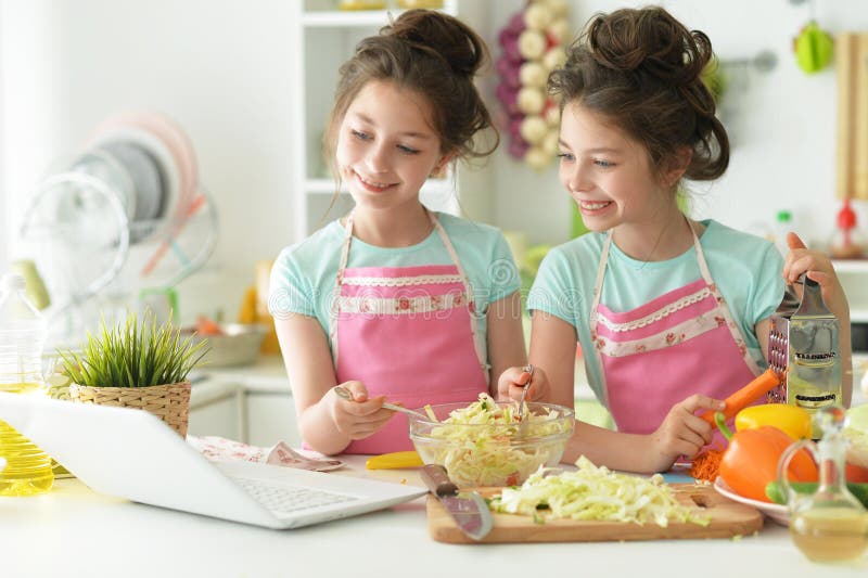 Portrait of Two Girls Sisters in the Kitchen Cook Stock Image - Image ...