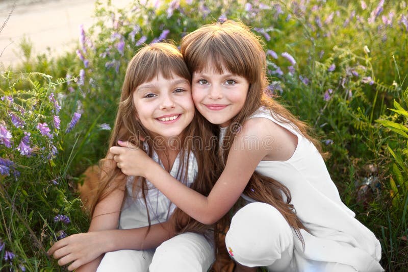 Portrait of two girls stock photo. Image of hair, blue - 42974082