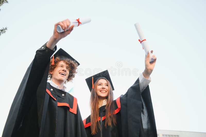 Portrait of Two Happy Graduating Students. Stock Photo - Image of ...