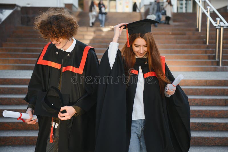 Portrait of Two Happy Graduating Students. Stock Image - Image of ...