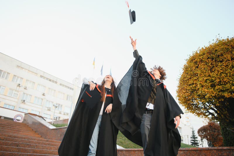 Portrait of Two Happy Graduating Students. Stock Photo - Image of ...