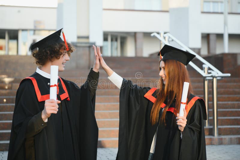 Portrait of Two Happy Graduating Students. Stock Photo - Image of ...
