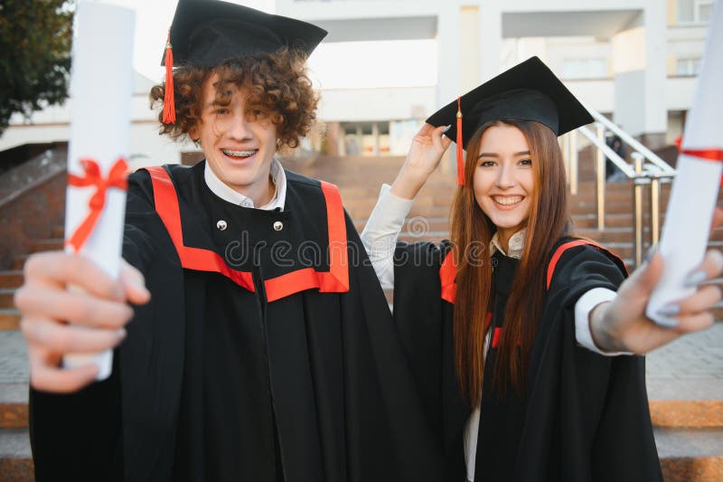 Portrait of Two Happy Graduating Students. Stock Image - Image of ...