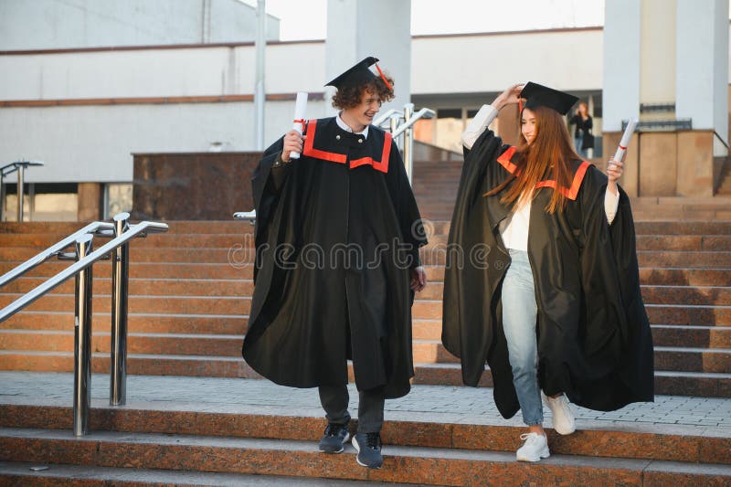 Portrait of Two Happy Graduating Students. Stock Photo - Image of ...