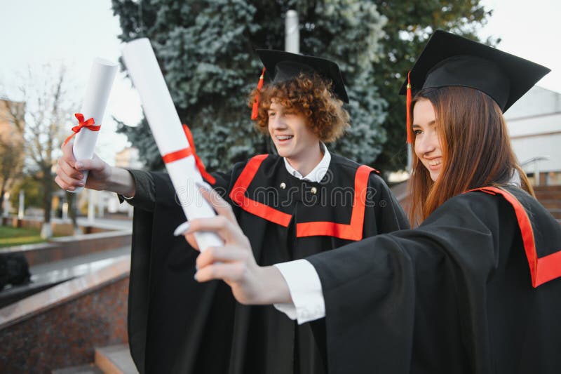 Portrait of Two Happy Graduating Students. Stock Image - Image of white ...
