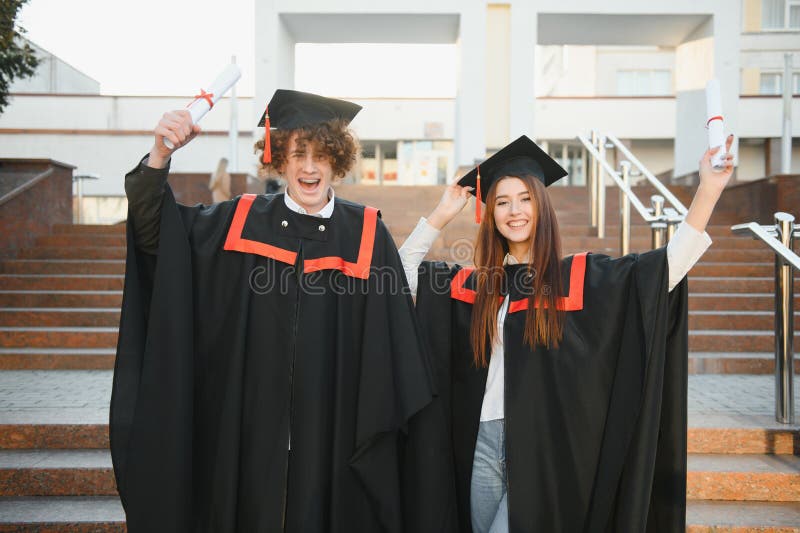 Portrait of Two Happy Graduating Students. Stock Photo - Image of ...