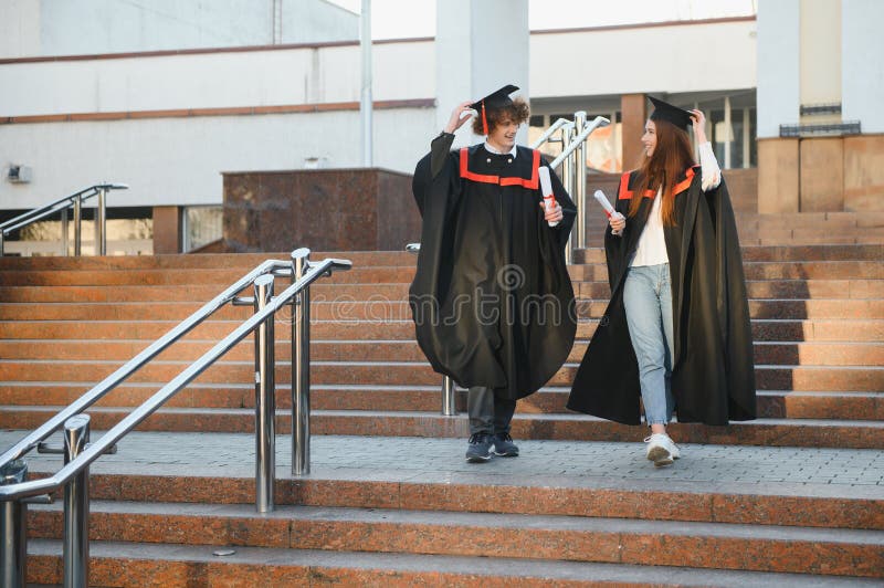 Portrait of Two Happy Graduating Students. Stock Image - Image of ...