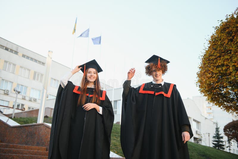 Portrait of Two Happy Graduating Students. Stock Photo - Image of ...
