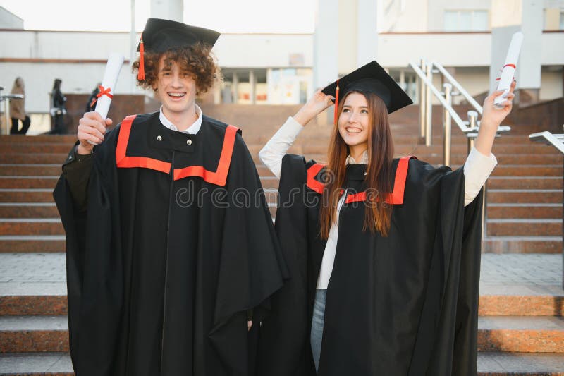 Portrait of Two Happy Graduating Students. Stock Image - Image of ...