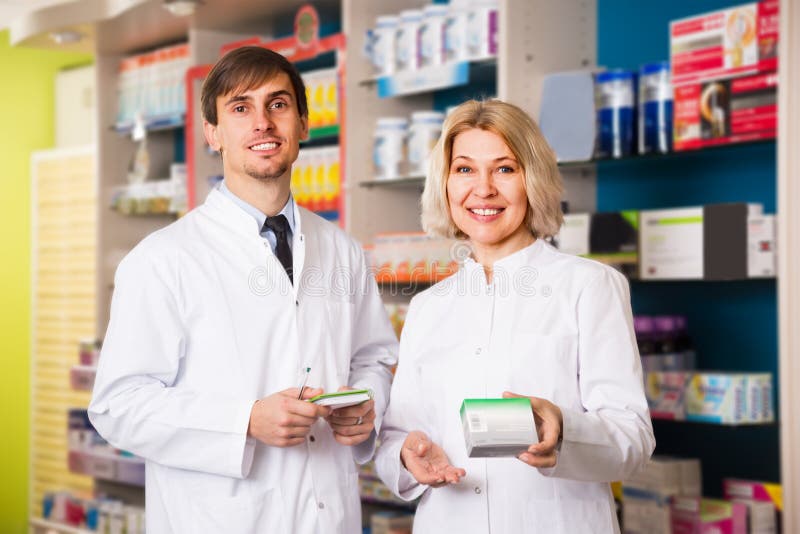 Portrait of Two Happy Pharmacists Stock Photo - Image of happy ...