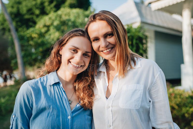 Portrait of Two Happy Sisters Hugging Stock Photo - Image of mother ...