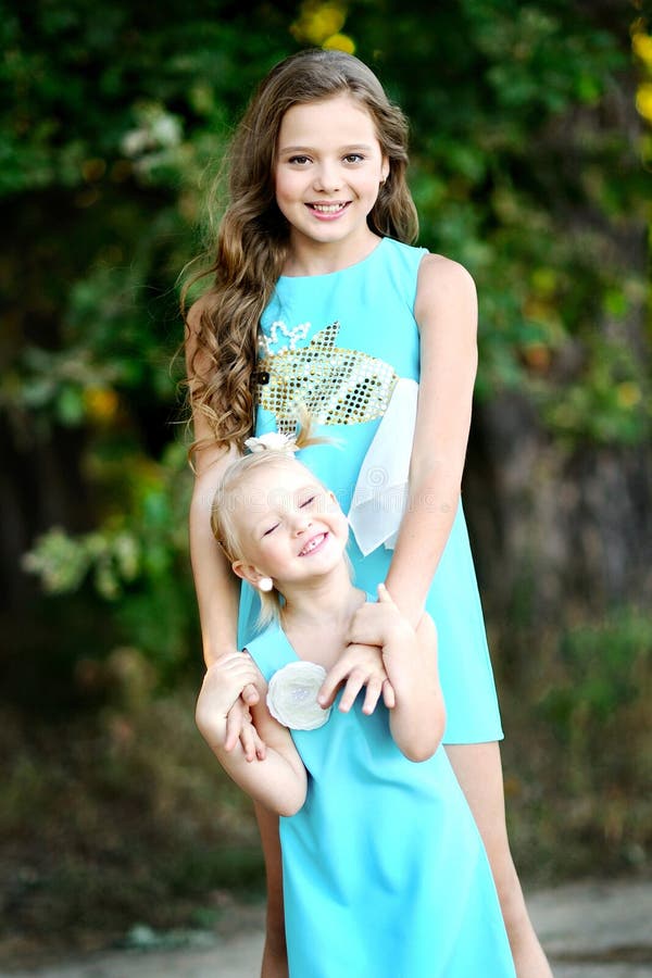 Portrait of Two Happy Sisters Stock Photo - Image of beautiful, love ...