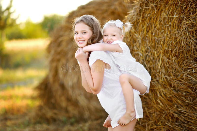 Portrait of Two Happy Sisters Stock Photo - Image of childhood, spring ...