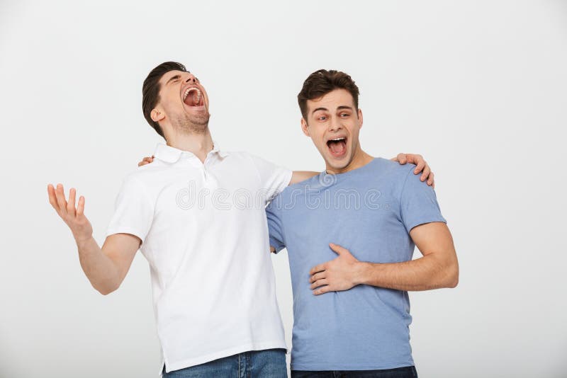 Portrait of Two Happy Young Men Laughing Stock Photo - Image of person ...