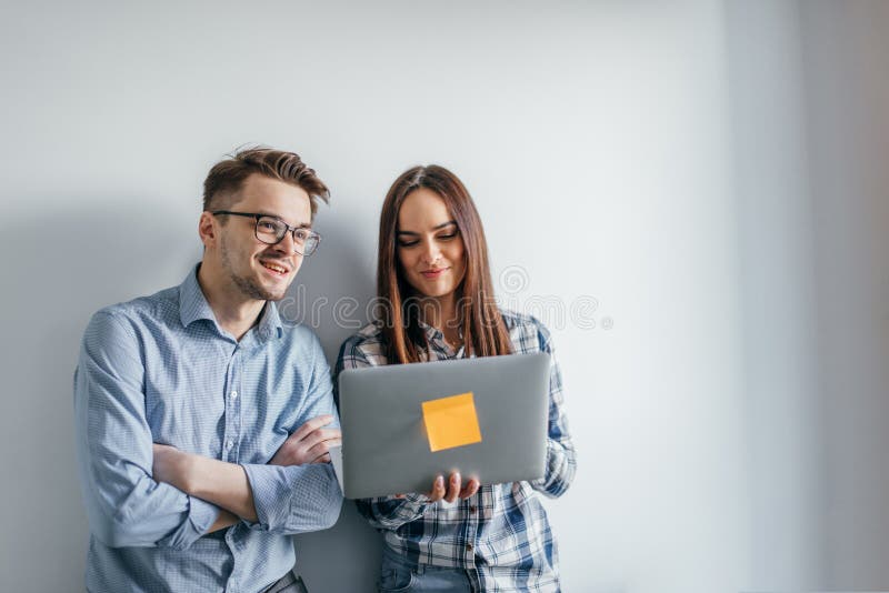 3,464 Two People Standing Using Computer Stock Photos - Free & Royalty ...