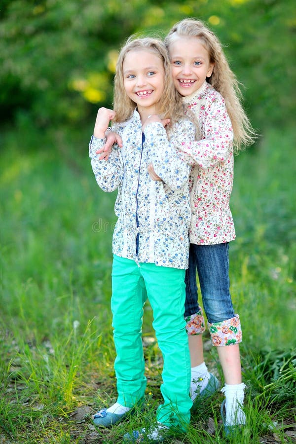 Portrait of Two Little Girls Stock Photo - Image of laughter, emotions ...