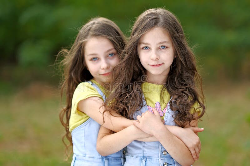 Portrait of Two Little Girls Stock Photo - Image of childhood, outdoor ...