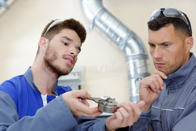 Portrait Two Mechanics Working Together Stock Photo - Image of ...