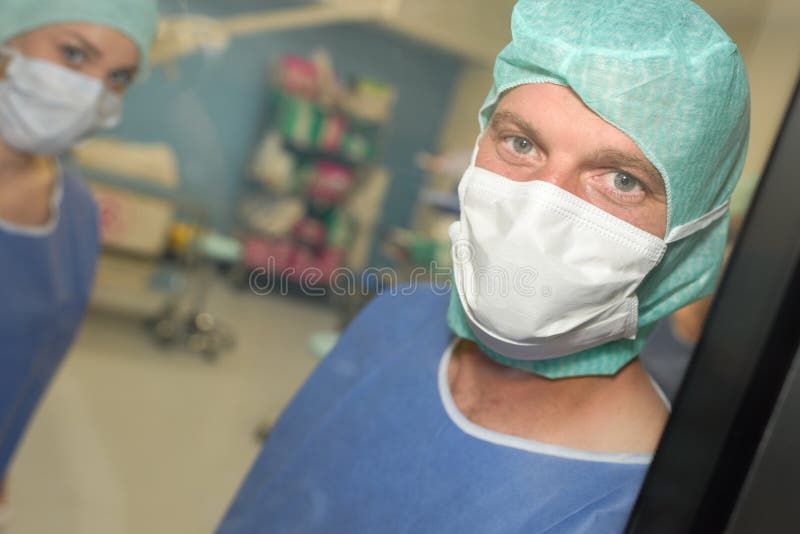 Portrait Two Medical Workers in Operating Theatre Stock Photo - Image ... Portrait Two Medical Workers in Operating Theatre Stock Photo - Image ...