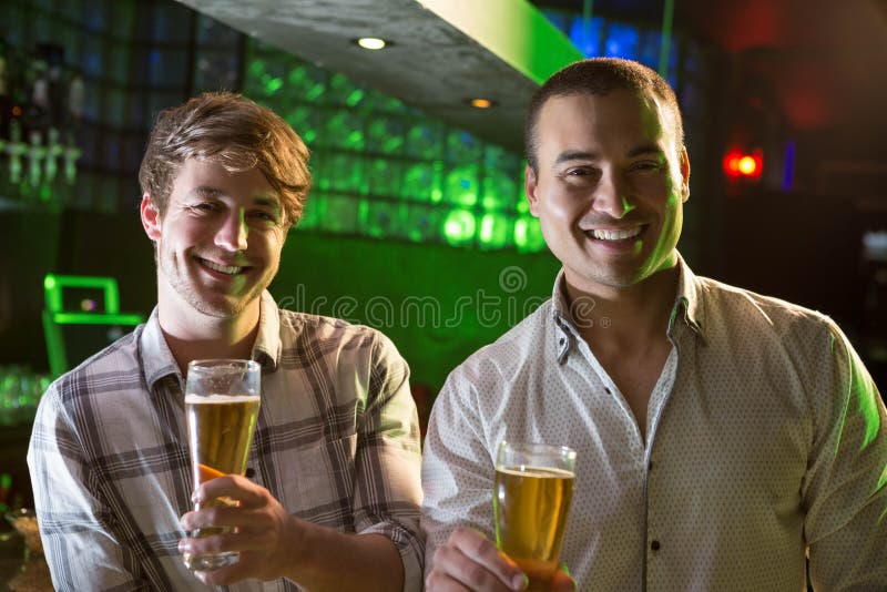 Portrait of Two Men Having Beer at Bar Stock Image - Image of caucasian ...