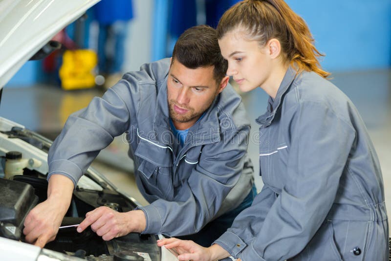 Portrait Two Positive Workers Fixing Car To Satisfied Client Stock ...