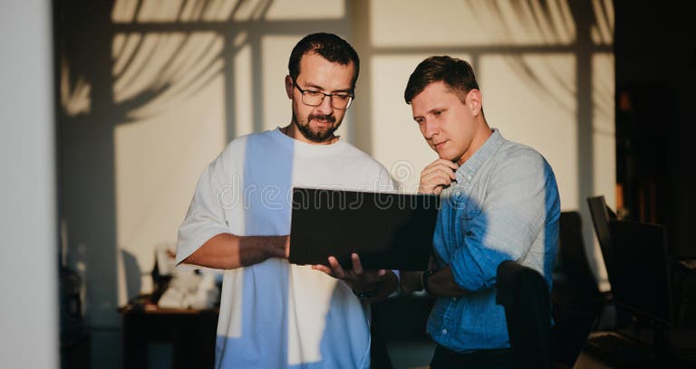 Portrait of Two Professional Male Programmers Working on Computer in ...