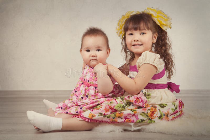 Portrait of two sisters stock image. Image of indoor - 29815403