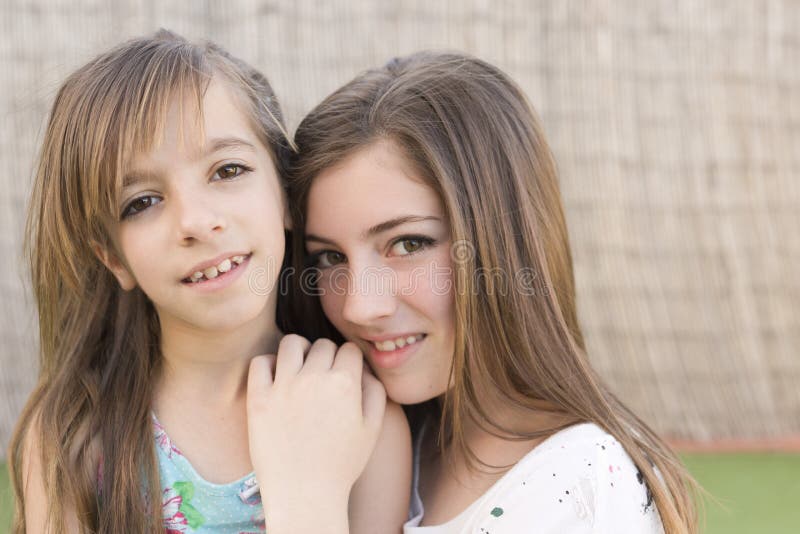 Portrait of two sisters stock photo. Image of sisters - 72370916