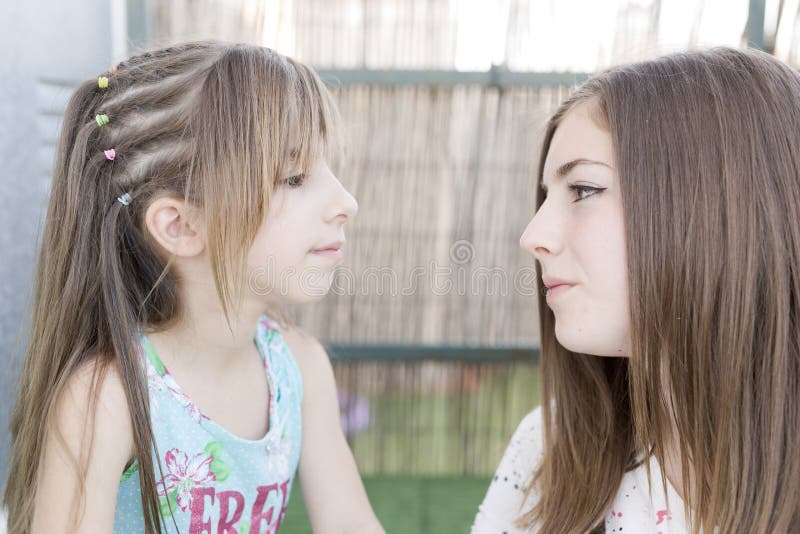Portrait of two sisters stock photo. Image of sisters - 72370978