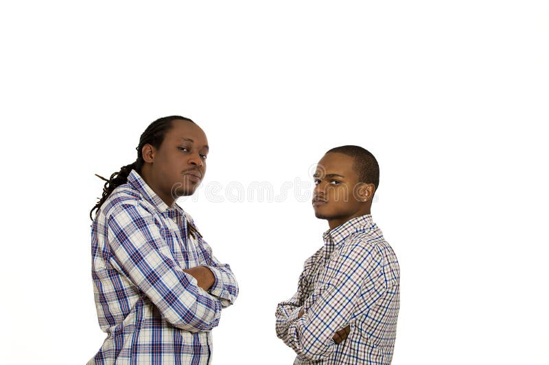 Portrait of Two Suspicious Young Men Looking at Camera Stock Photo ...