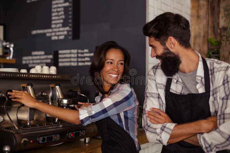 Portrait of Two Waiters with a Coffee Machine Stock Image - Image of ...