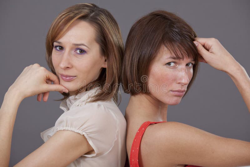 Portrait of Two Women in Studio Stock Photo - Image of studio, brunette ...