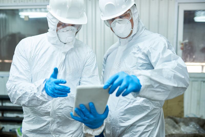 Workers in Bio Hazard Lab stock image. Image of safety - 174249135