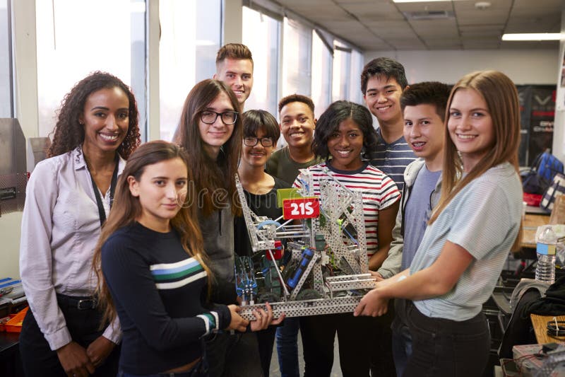 Portrait of University Students with Teacher Holding Machine in Science ...
