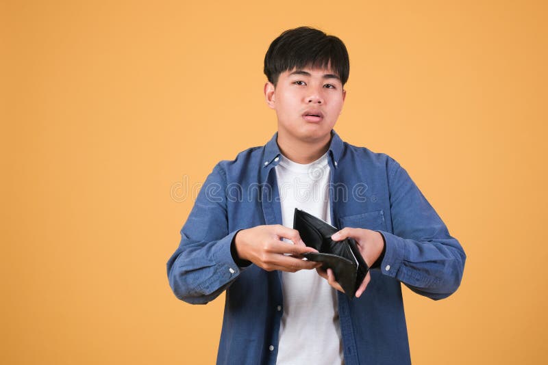 Portrait of Upset Asian Man Looking at His Empty Wallet. Stock Image ...