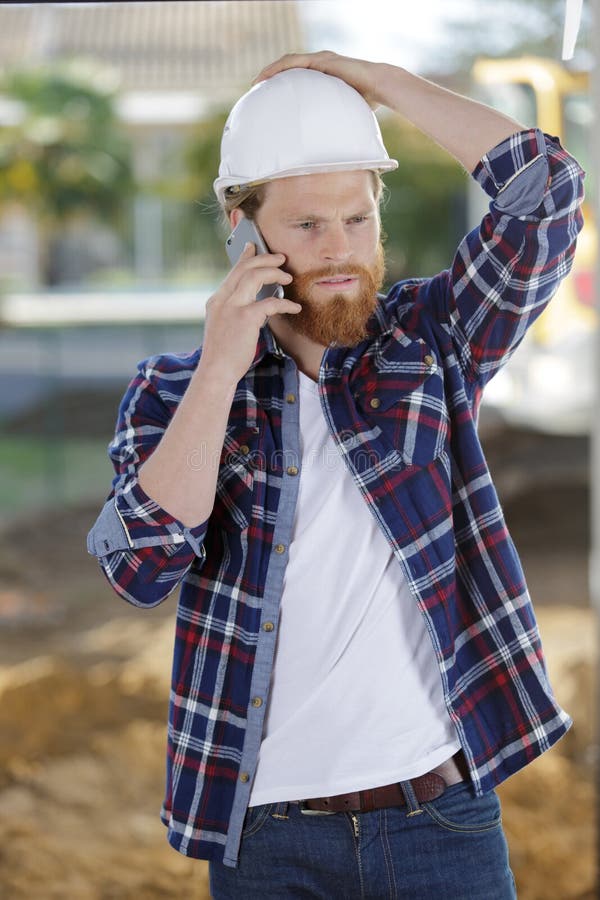 Portrait Upset Construction Worker Talking To Phone Stock Photo - Image ...
