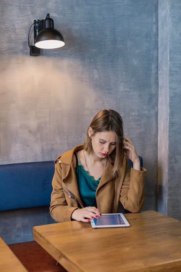 Portrait of a Very Pretty Girl with a Tablet in a Cafe. Stock Photo ...