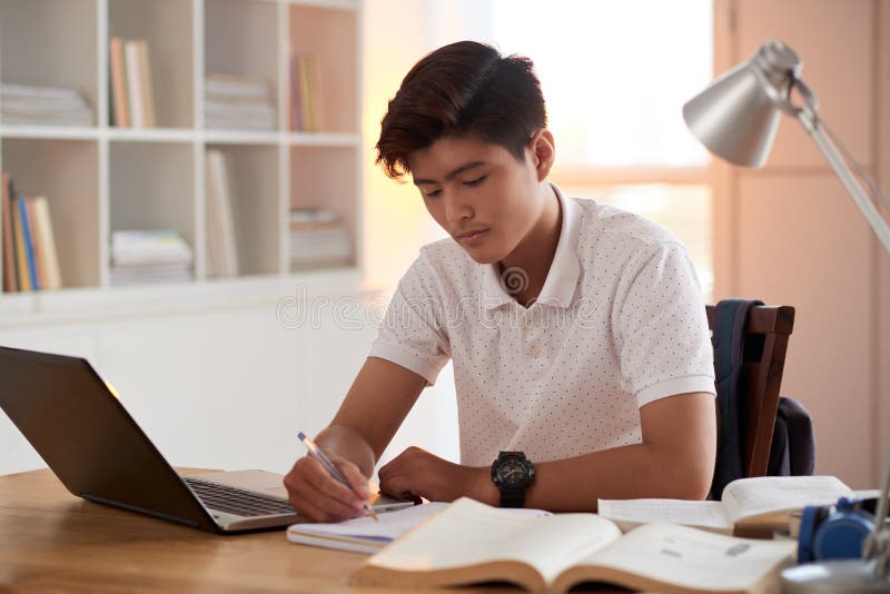 Doing homework stock image. Image of casual, studying - 96042407