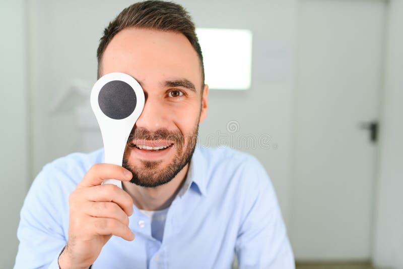 Portrait, Vision and Spoon with a Man Patient at the Optometrist for an ...