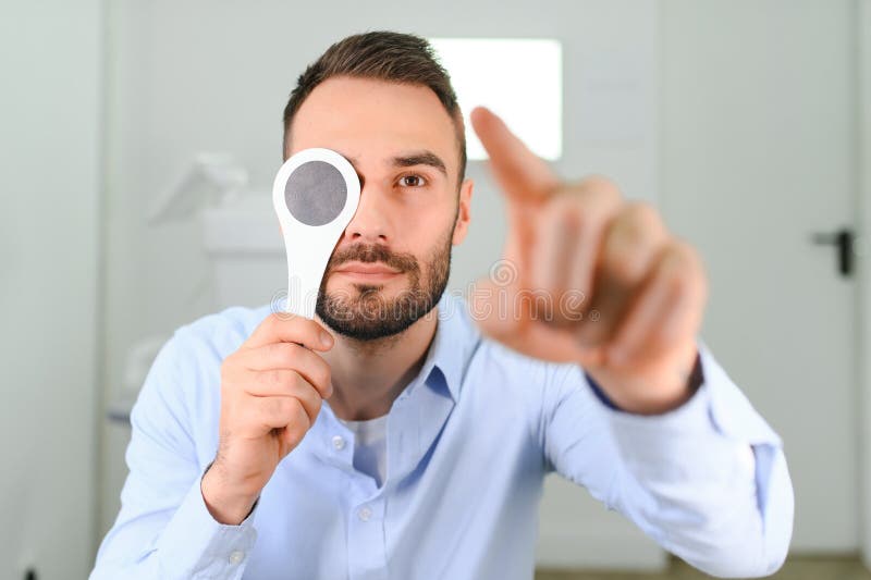 Portrait, Vision and Spoon with a Man Patient at the Optometrist for an ...