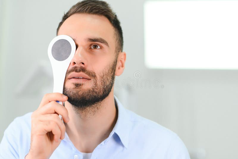 Portrait, Vision and Spoon with a Man Patient at the Optometrist for an ...