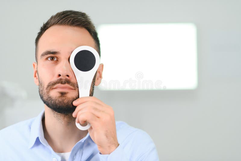 Portrait, Vision and Spoon with a Man Patient at the Optometrist for an ...