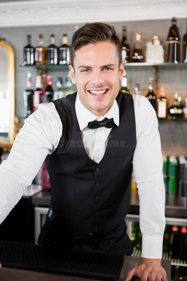 Portrait of Waiter Standing at Bar Counter Stock Photo - Image of ...