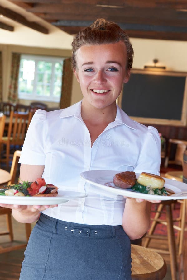 Portrait of Waitress Serving Food in Restaurant Stock Image - Image of ...