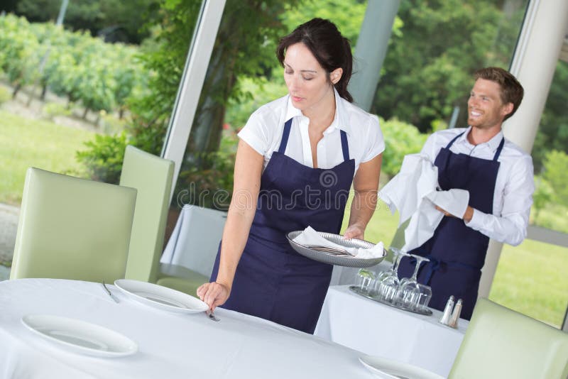 Portrait Waitress Setting Table Stock Photo - Image of steel, vineyard ...