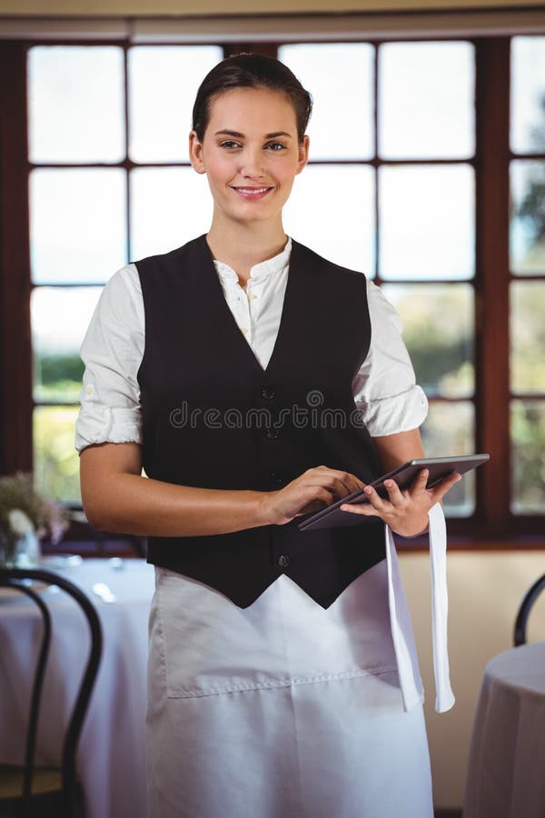 Portrait of Waitress Using Digital Tablet Stock Photo - Image of ...