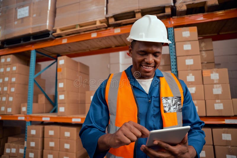 Portrait of a Warehouse Manager Keeping Stock Records Using Digital ...